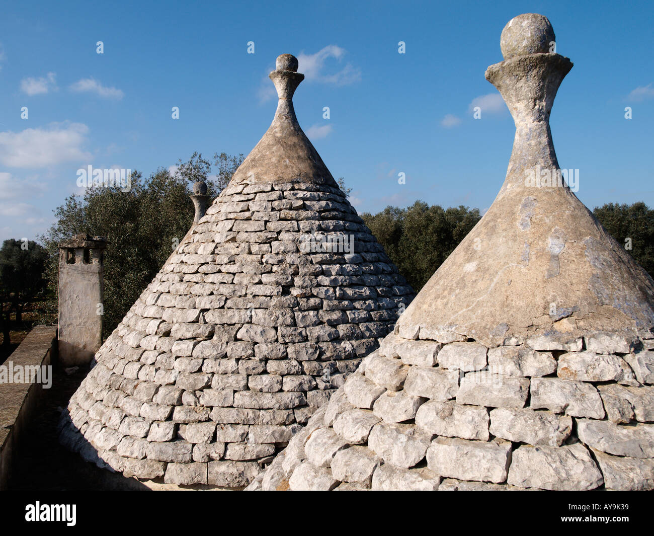 Roofs of a traditional Puglian building called a Trulli or Trullo with ...