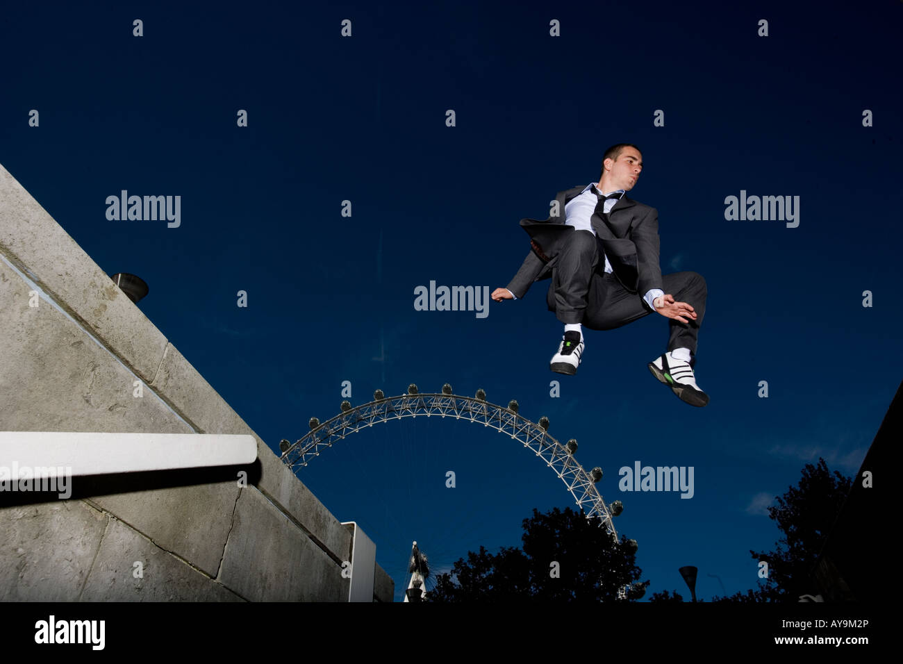 JUMP LONDON IN SUITS Stock Photo - Alamy