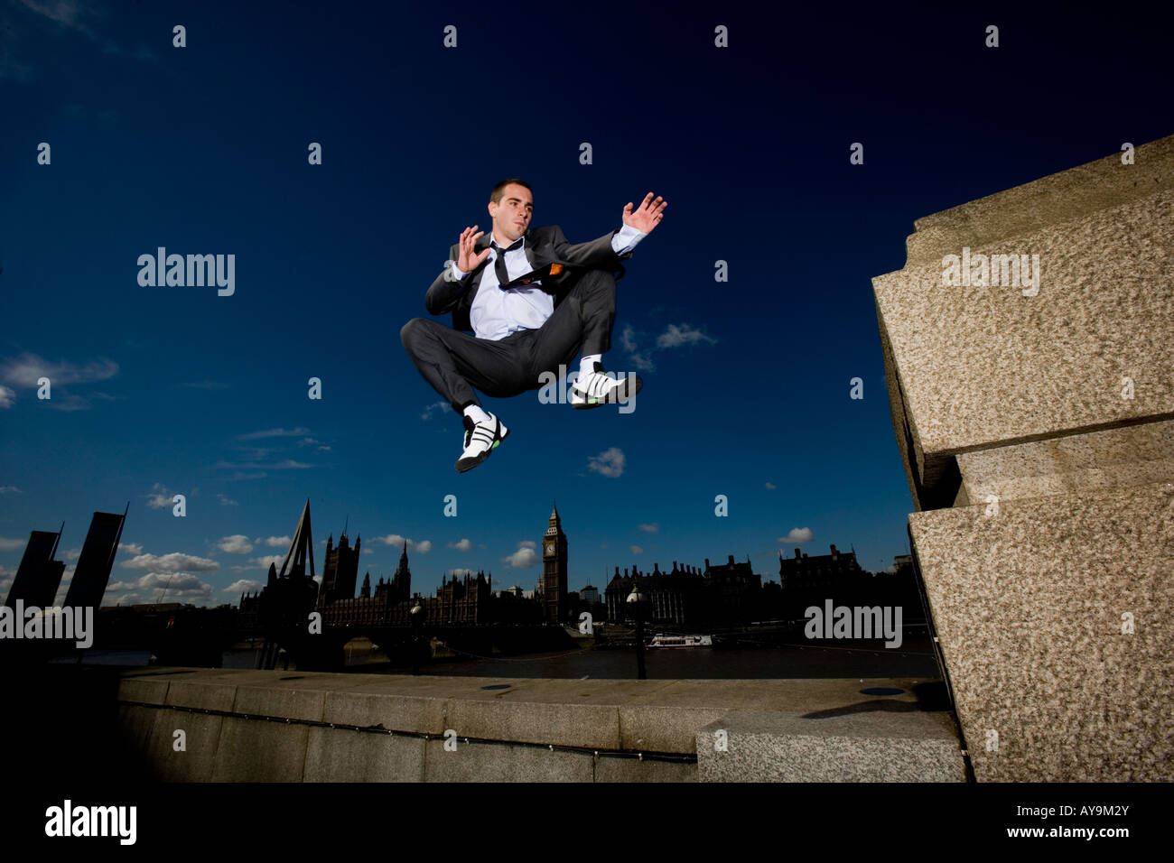JUMP LONDON IN SUITS Stock Photo - Alamy