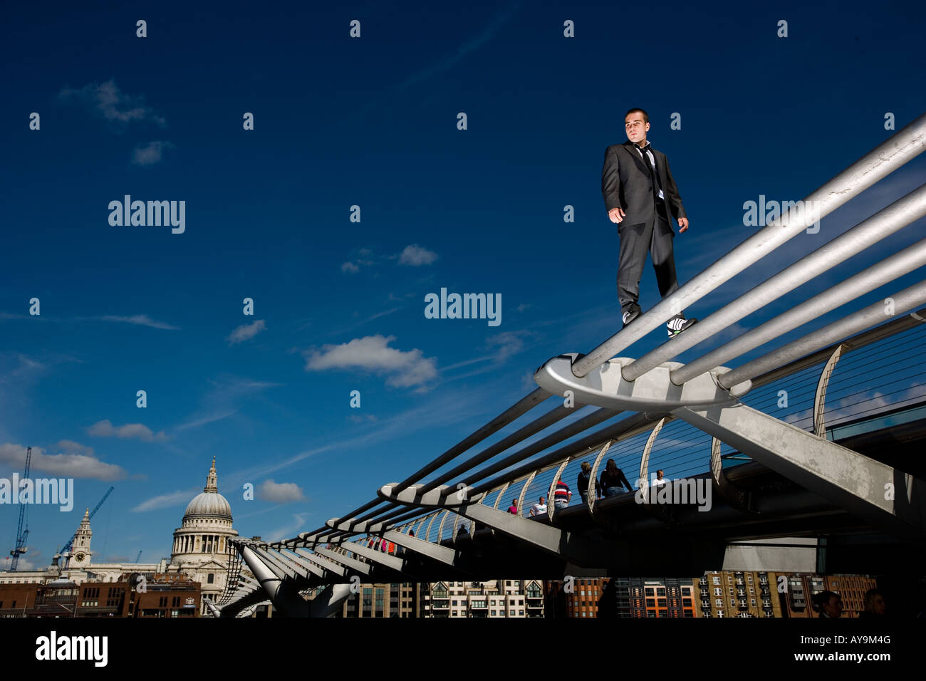 Jump london in suits hi-res stock photography and images - Alamy