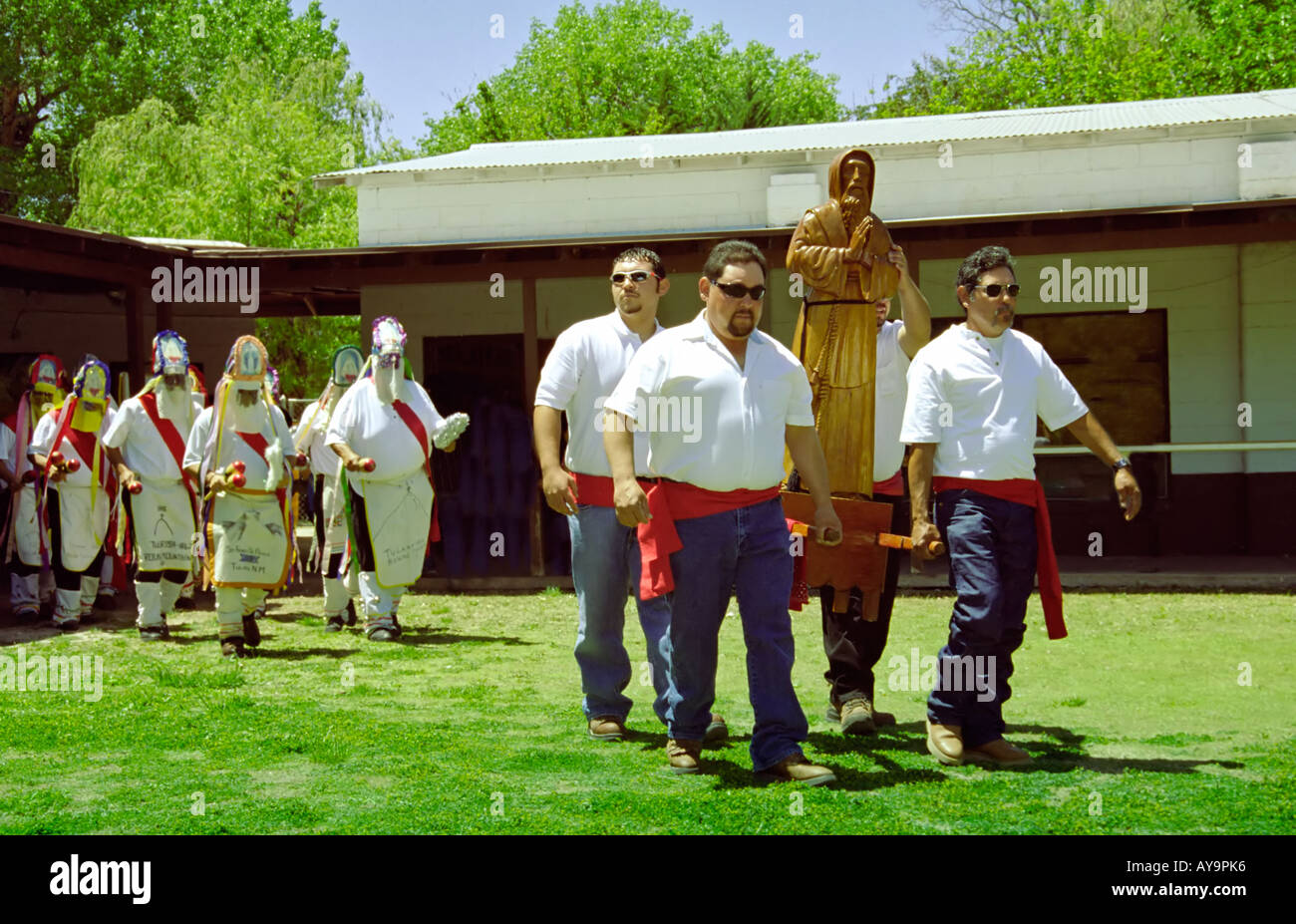 Hand-carried statue of Saint Francis of Assisi arrives during fiesta ...