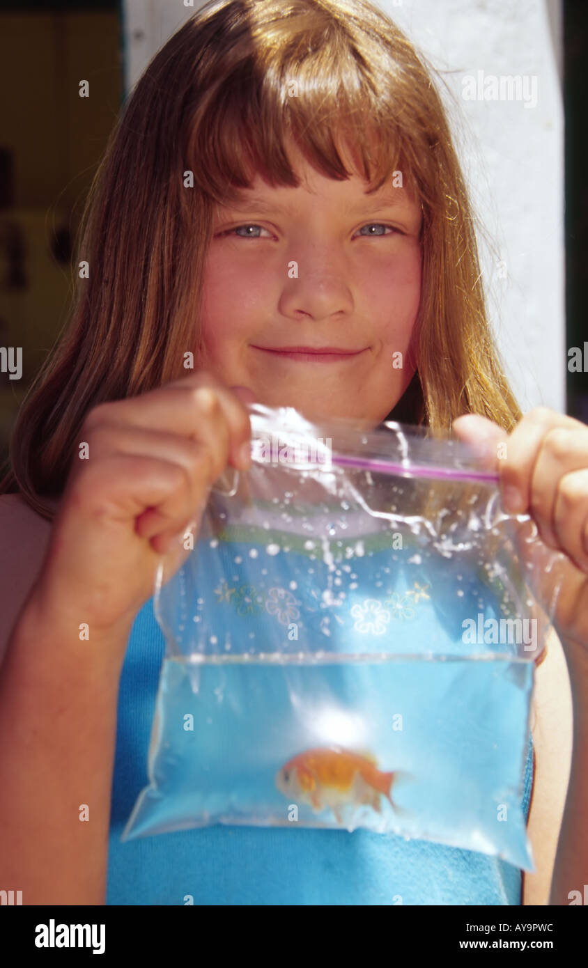 MR 520 Candace Suggs has landed a goldfish prize during fiesta at ...
