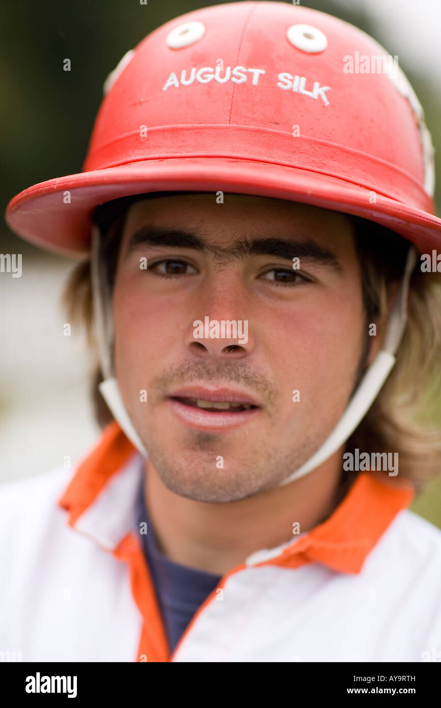 Polo player in helmet, portrait Stock Photo - Alamy
