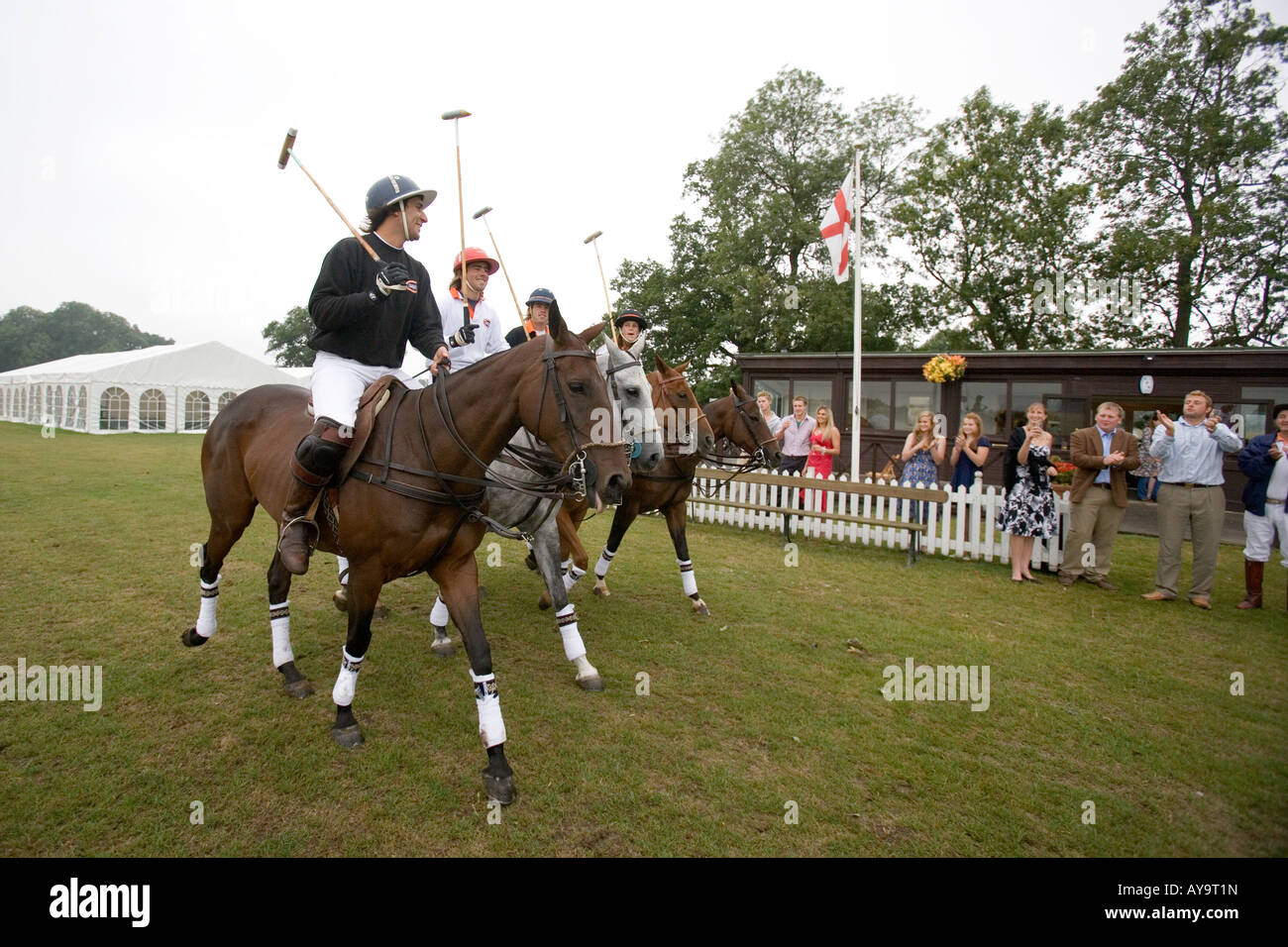 Three polo players hi-res stock photography and images - Alamy