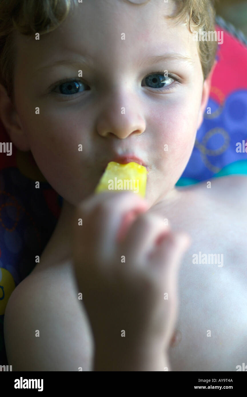 Child smiling with popsicle hi-res stock photography and images - Alamy