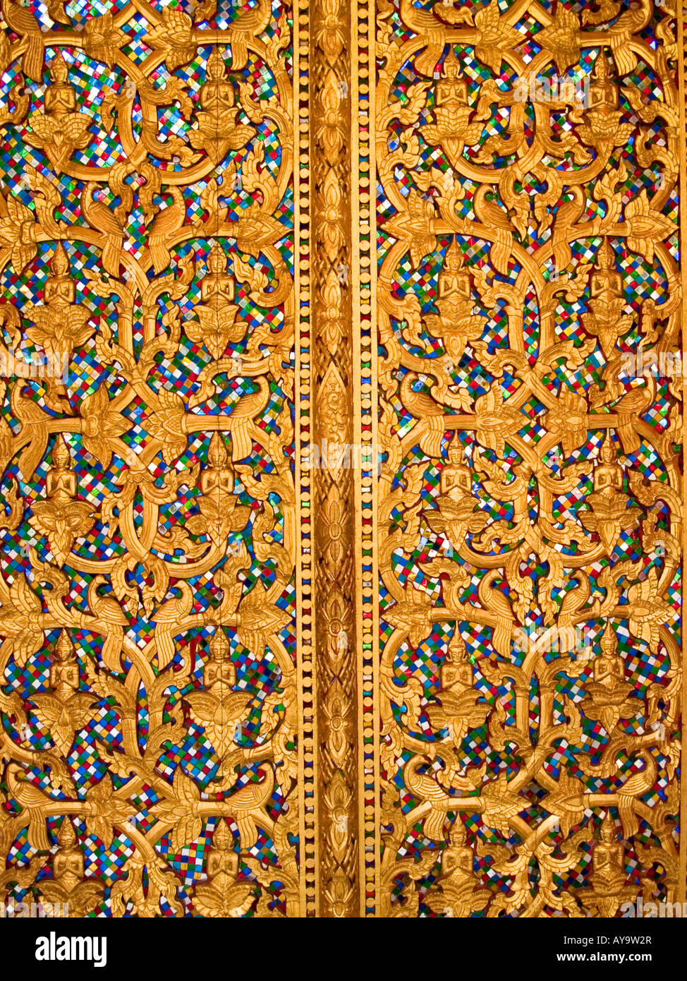 golden buddha images on Wat Impeng temple door in Vientiane Laos Stock ...