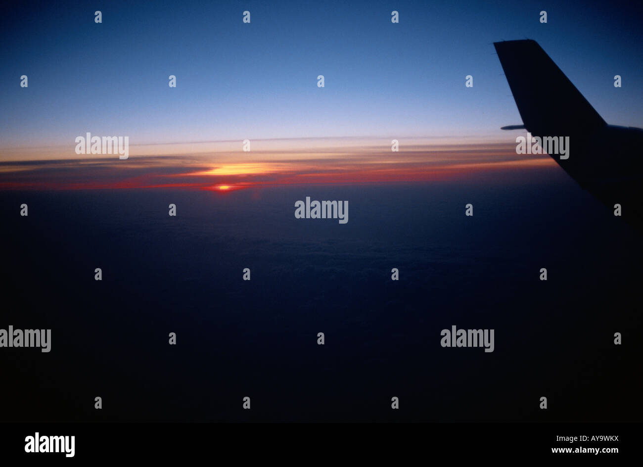 Setting Sun from Airplane Stock Photo - Alamy