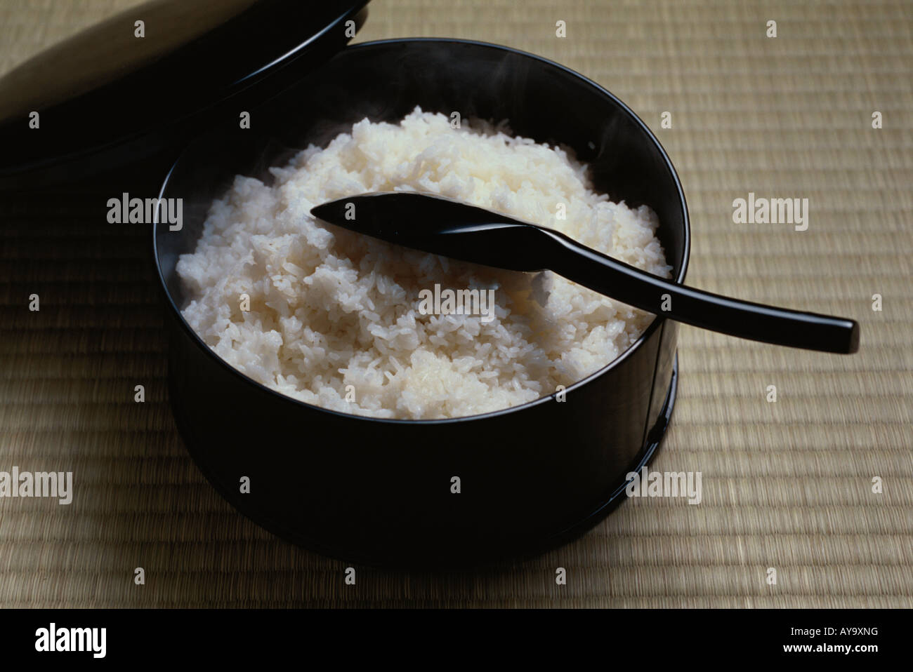 Cooked Rice with Scoop Stock Photo - Alamy