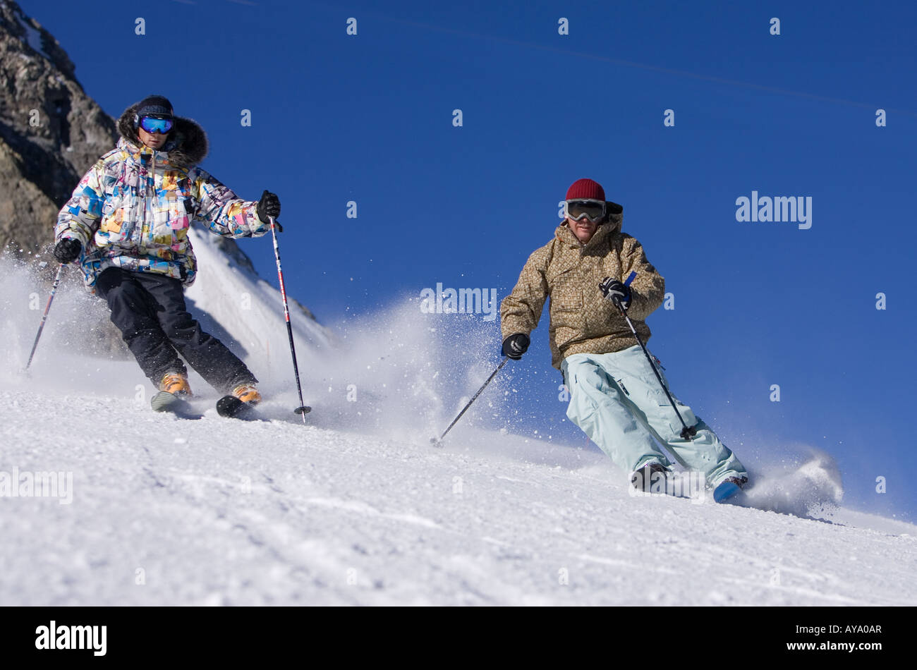 Two skiers dangerously close on slopes in Tignes, France Stock Photo ...