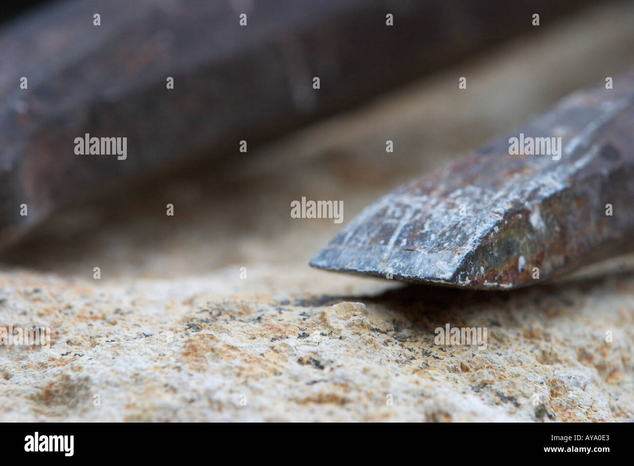 Detail from the sharp edge of a used black chisel Stock Photo - Alamy