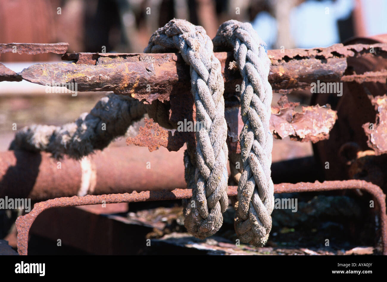 Rope around Rusty Iron Bar Stock Photo - Alamy