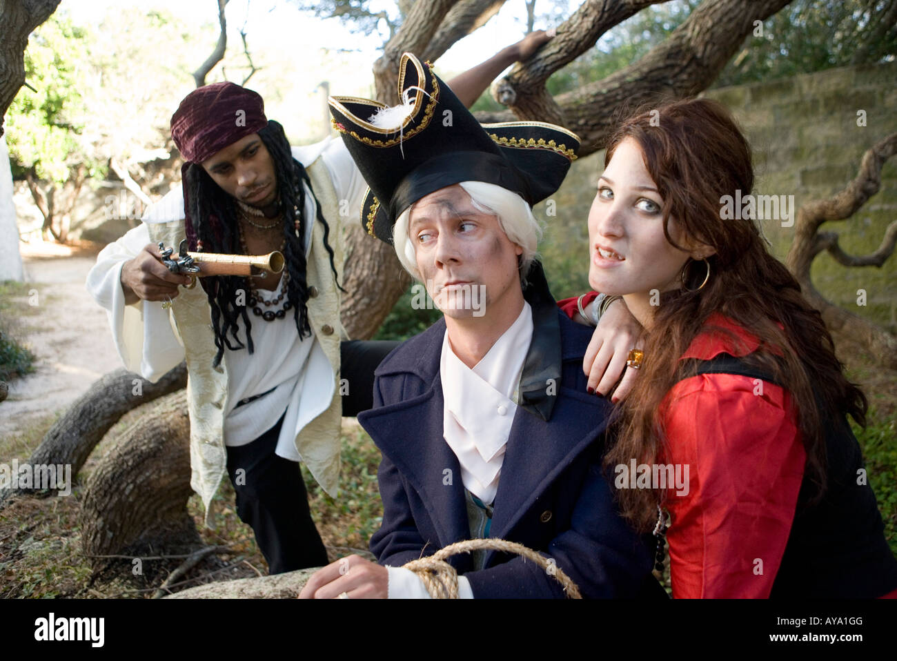 Armed pirates holding a navy officer as hostage and threatening him ...