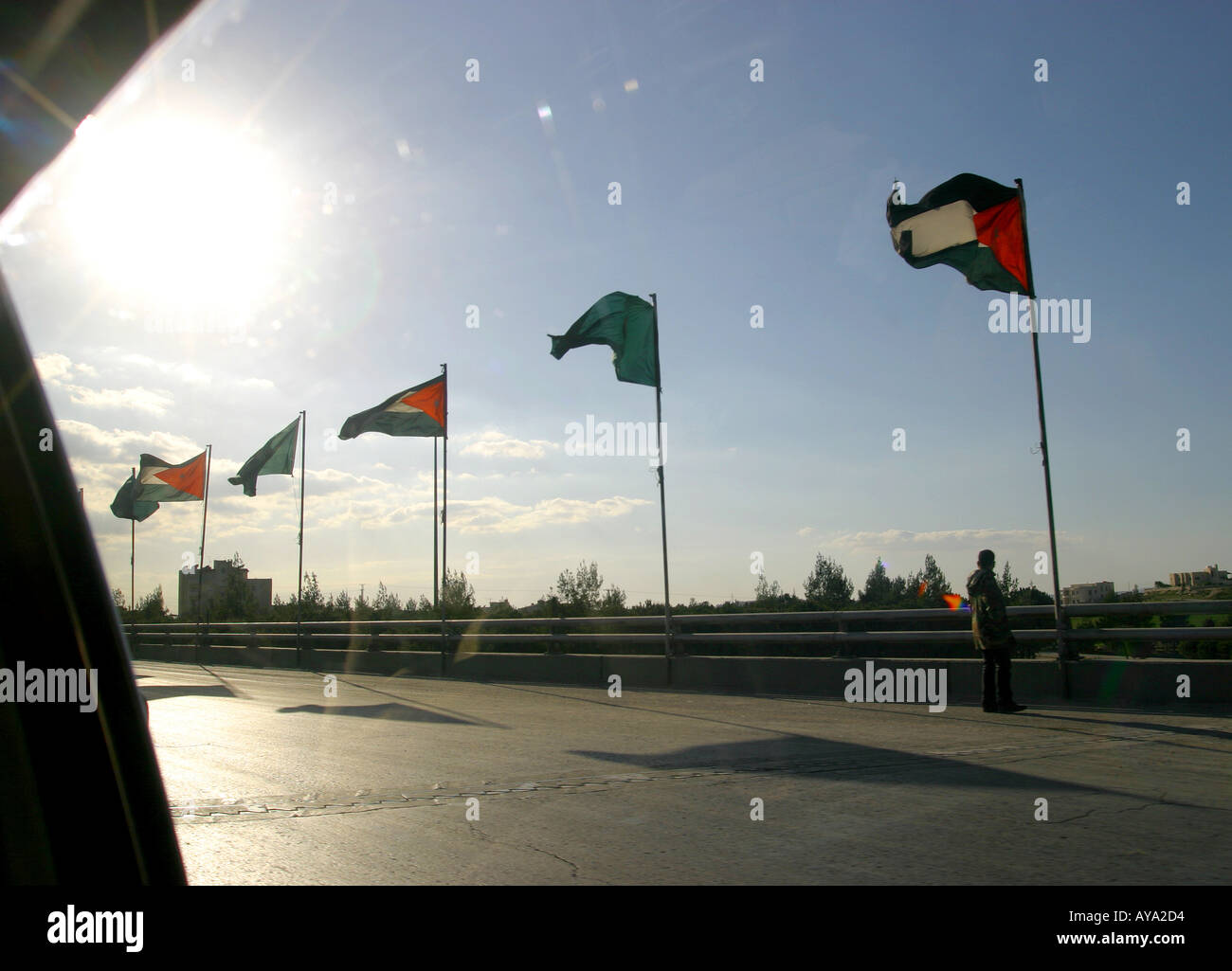 Flags on bridge Syria Stock Photo - Alamy