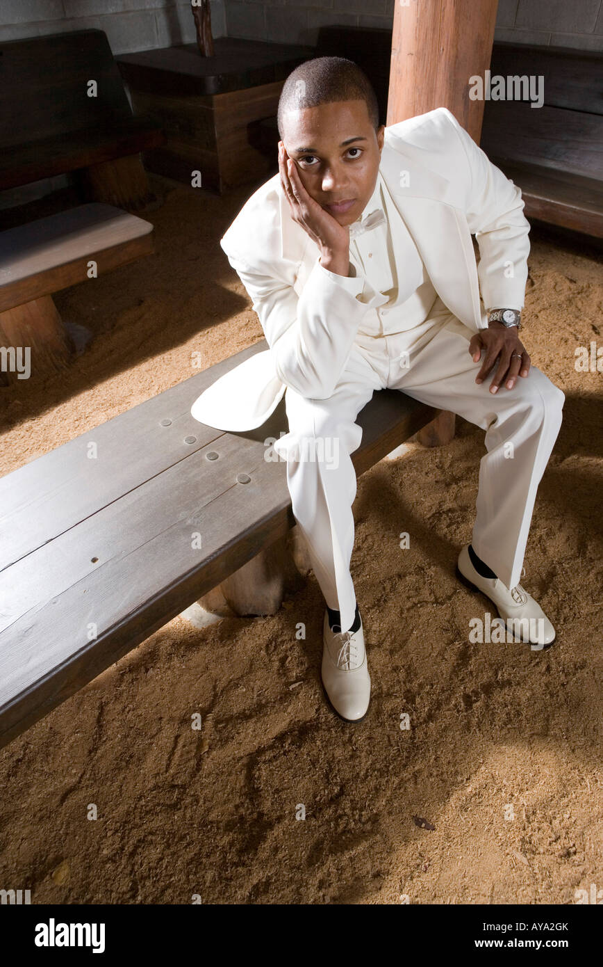 Portrait groom sitting alone on hi-res stock photography and images - Alamy