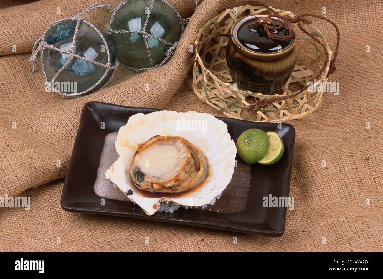 Scallop with Shell on Plate Stock Photo - Alamy