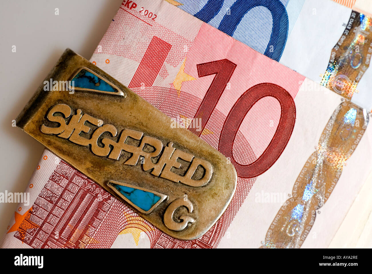 Moneyclip with bank-notes Stock Photo - Alamy