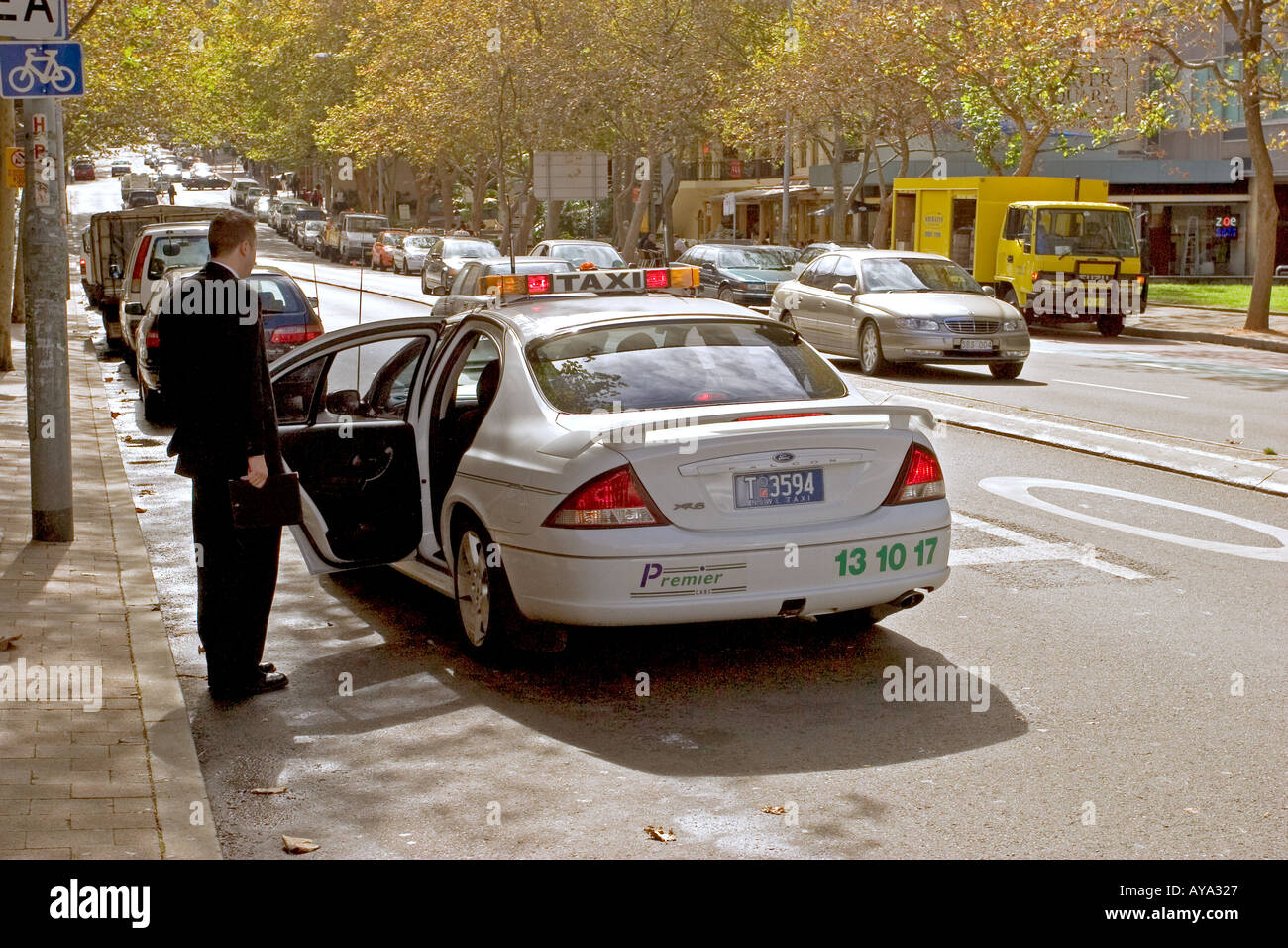 Business man and taxi Sydney Australia Stock Photo - Alamy