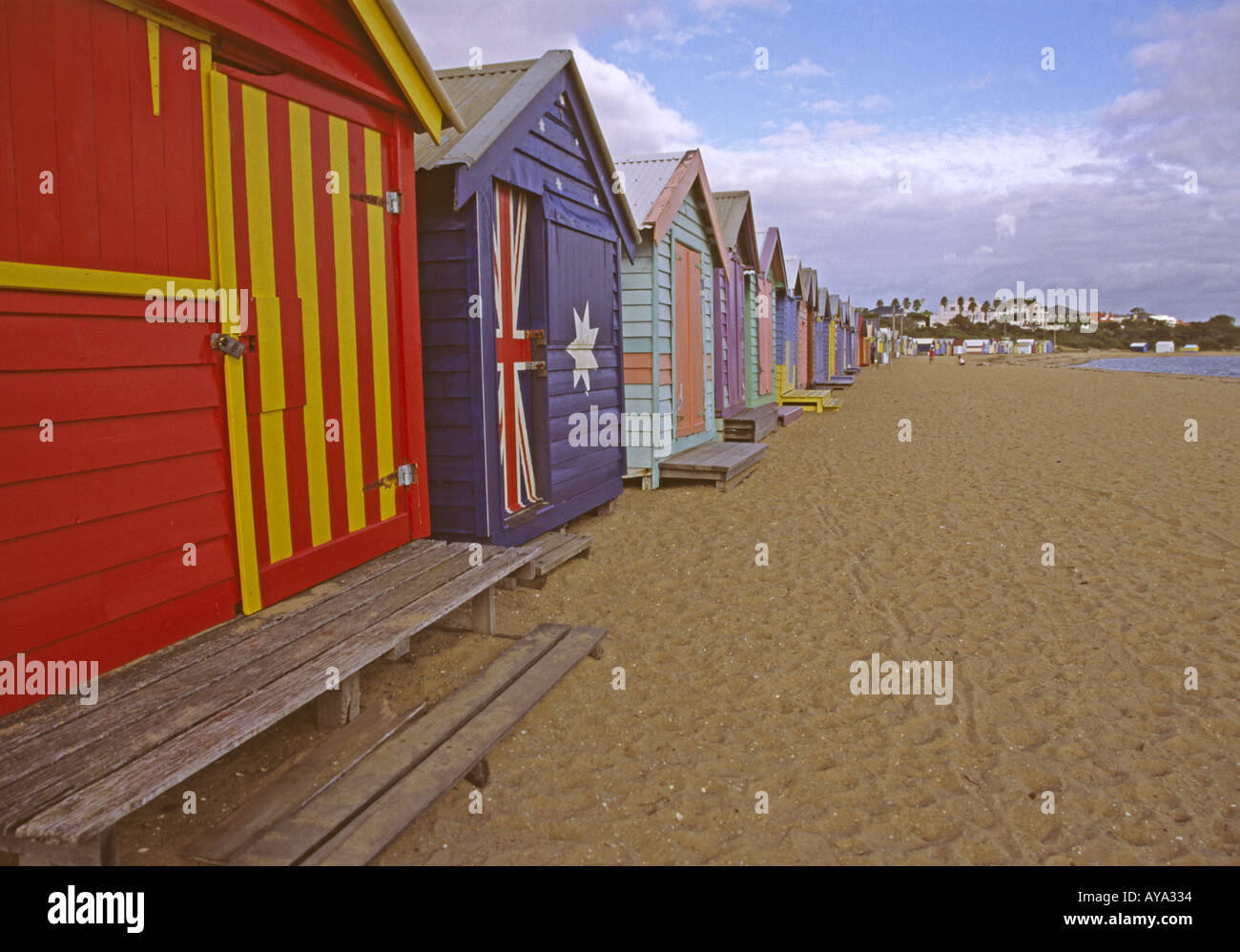 Row of brightly coloured bathing huts on Brighton Beach Melbourne ...