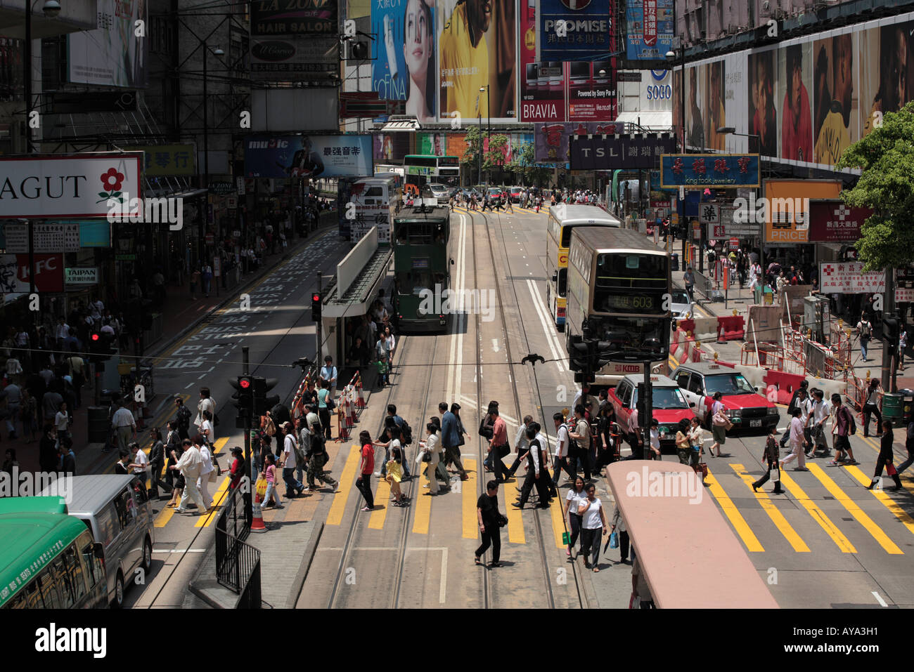 Asia Peoples Republic of China Hong Kong Pedestrians crowd crosswalk ...