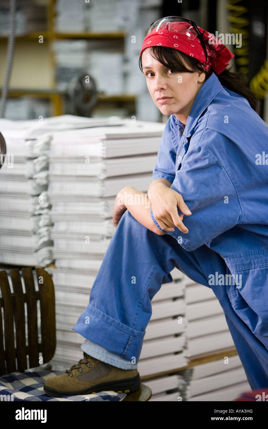 Female worker in a storage warehouse Stock Photo - Alamy