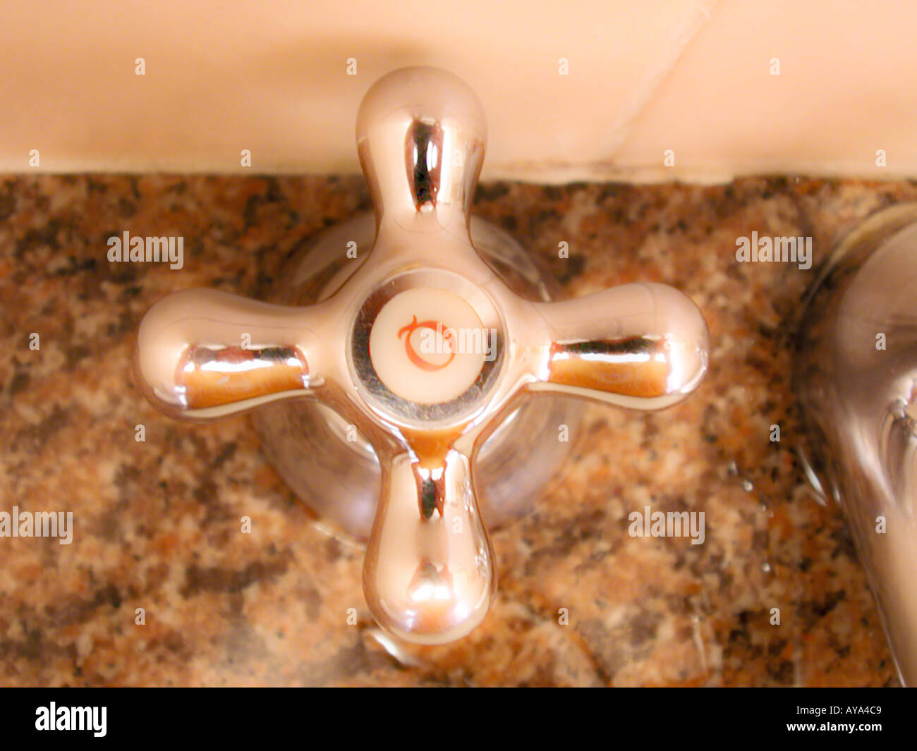 Hot faucet knob Stock Photo - Alamy