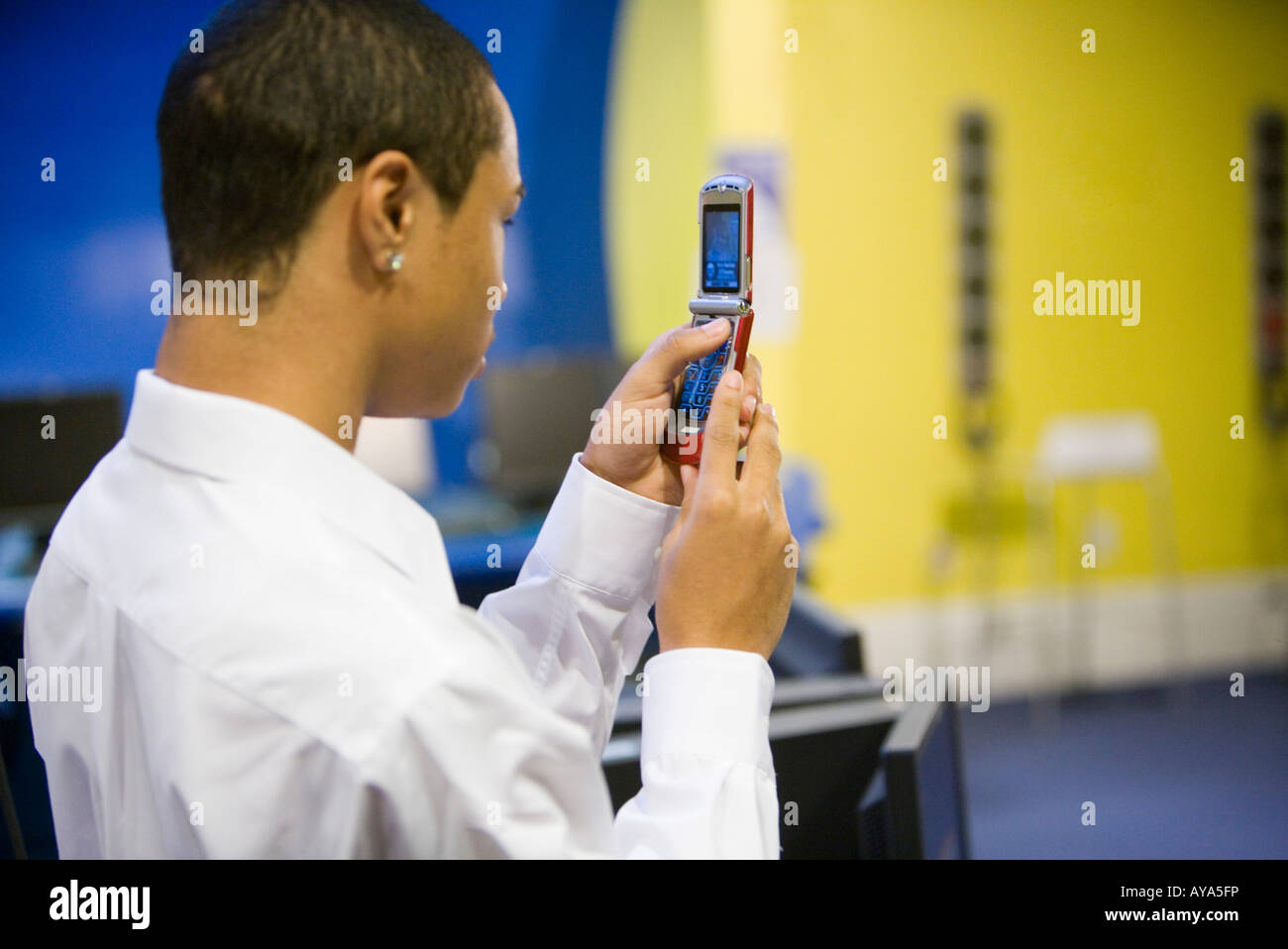 Teens using computers in computer lab hi-res stock photography and ...