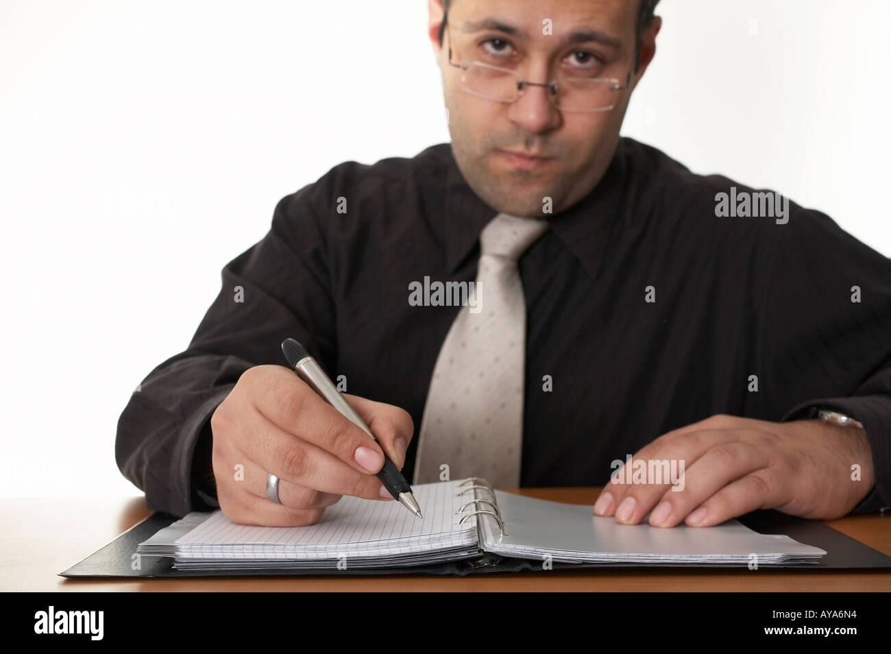 Business man at his desk Stock Photo - Alamy