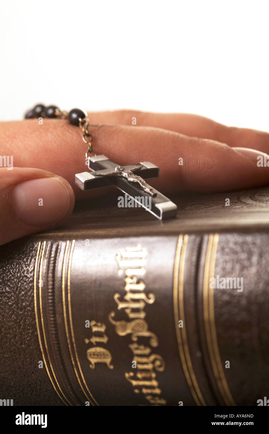 Hand on bible hi-res stock photography and images - Alamy