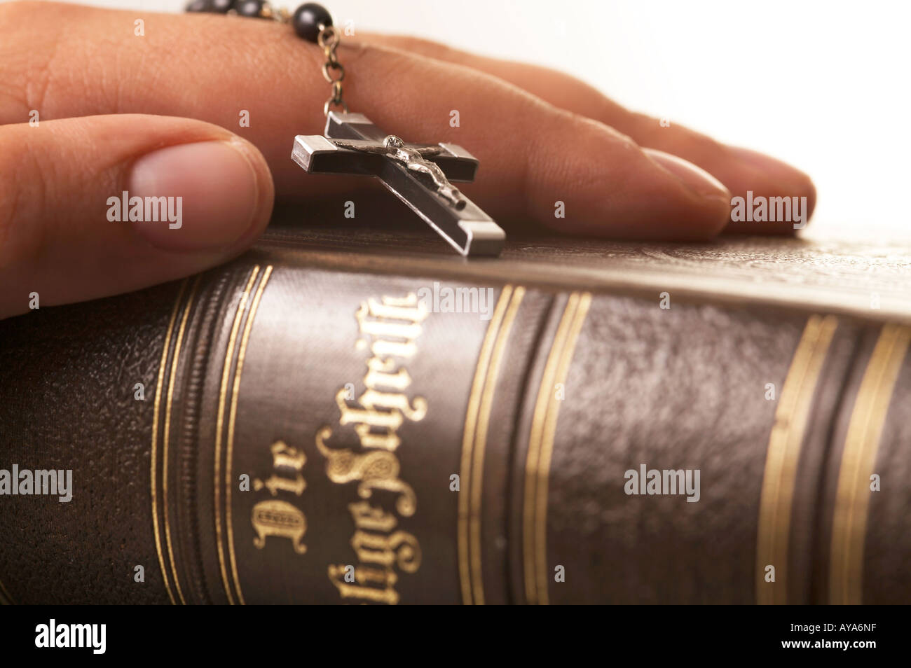 Hand on bible hi-res stock photography and images - Alamy