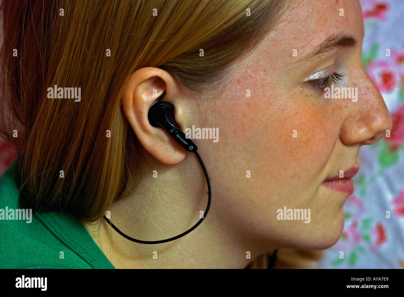 25 6 04 North Berwick UK Girl listening to a walkman Stock Photo - Alamy
