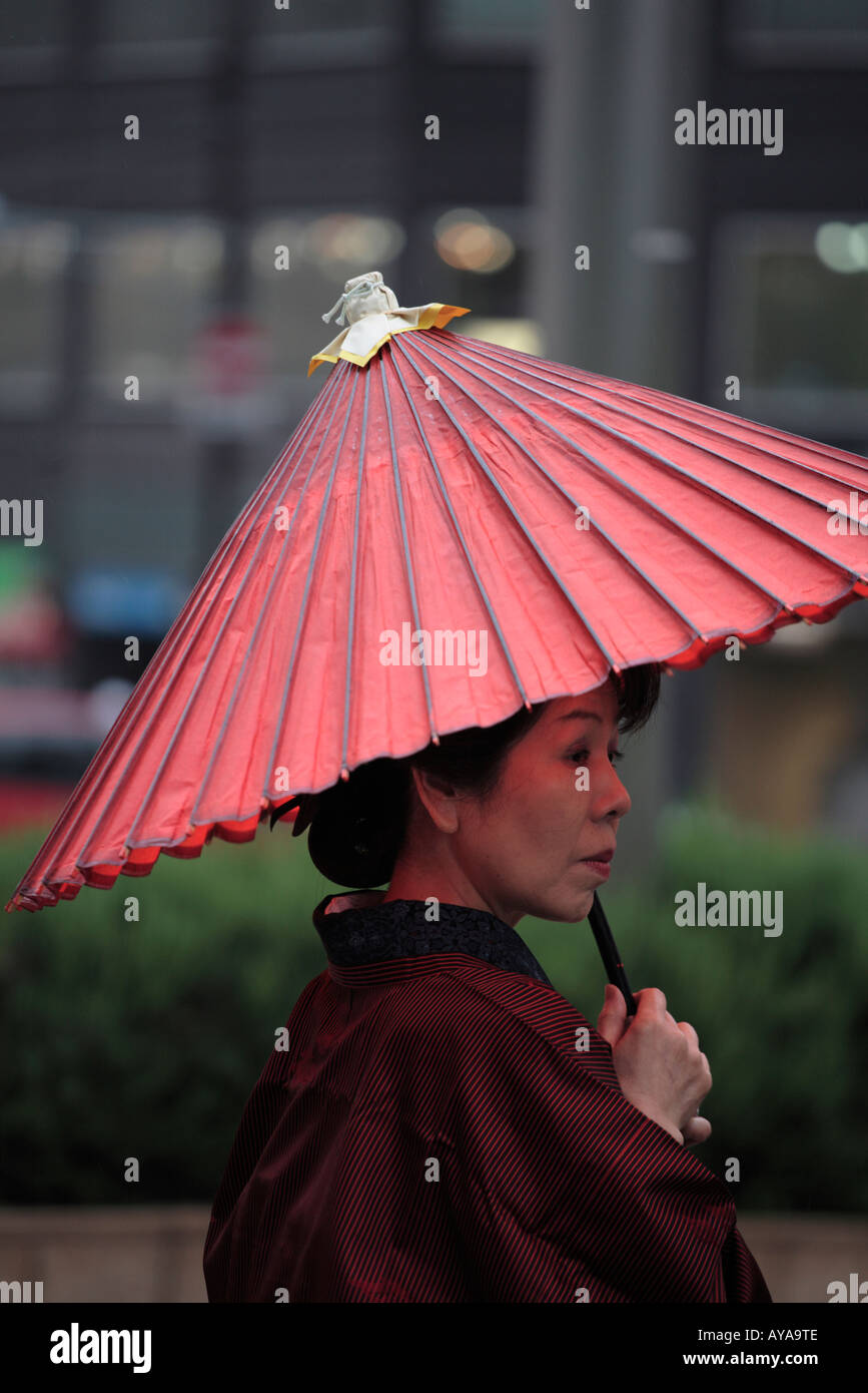 Asia Tokyo Japan Japanese woman wearing kimono holding umbrella during ...