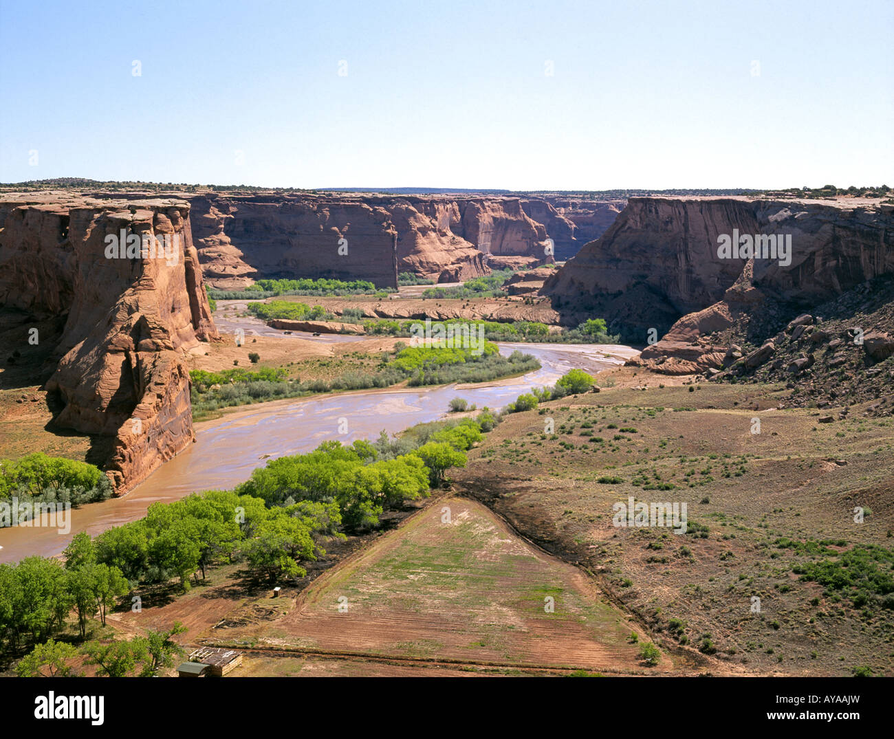 A view of the eroded riverbed and sandstone canyon walls of Canyon de ...