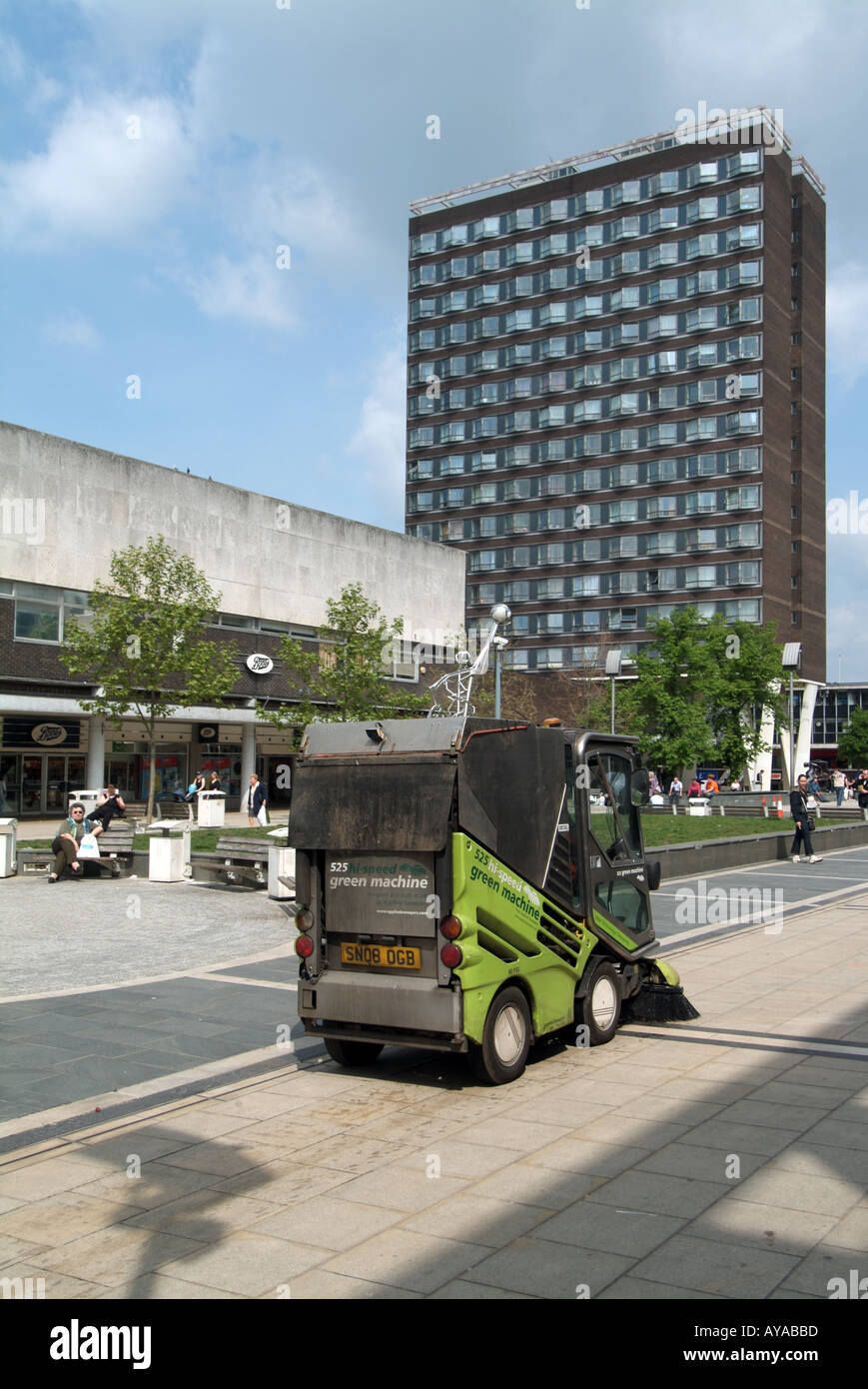 Basildon new town centre open space with shop units and high rise flats ...