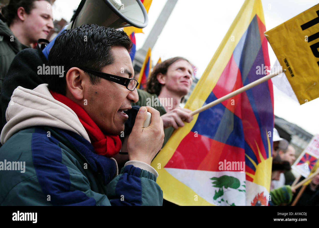 Human rights activist on loud-hailer during demonstration in Whitehall ...