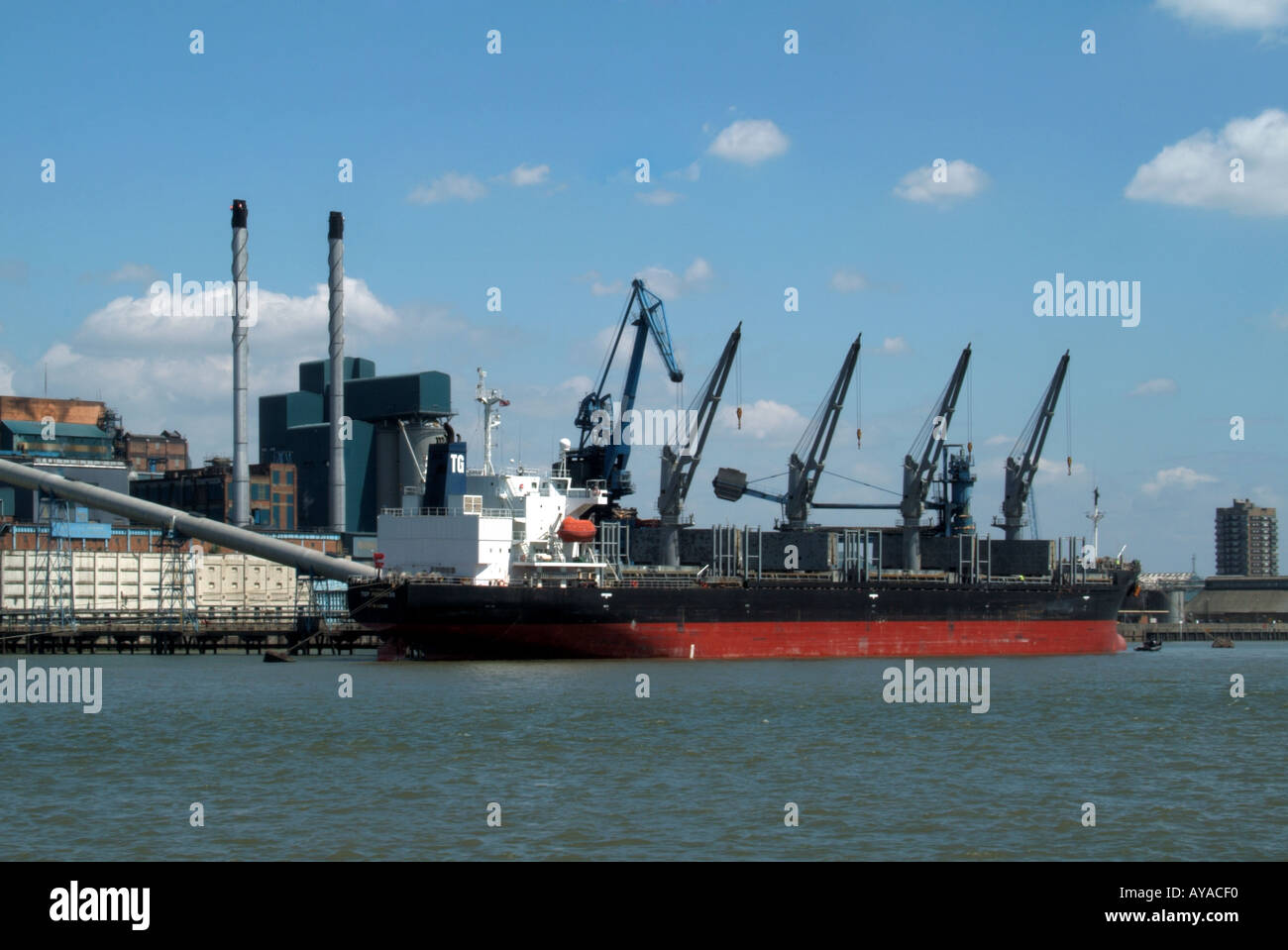 Tate and Lyle riverside sugar refinery factory business with freighter ...