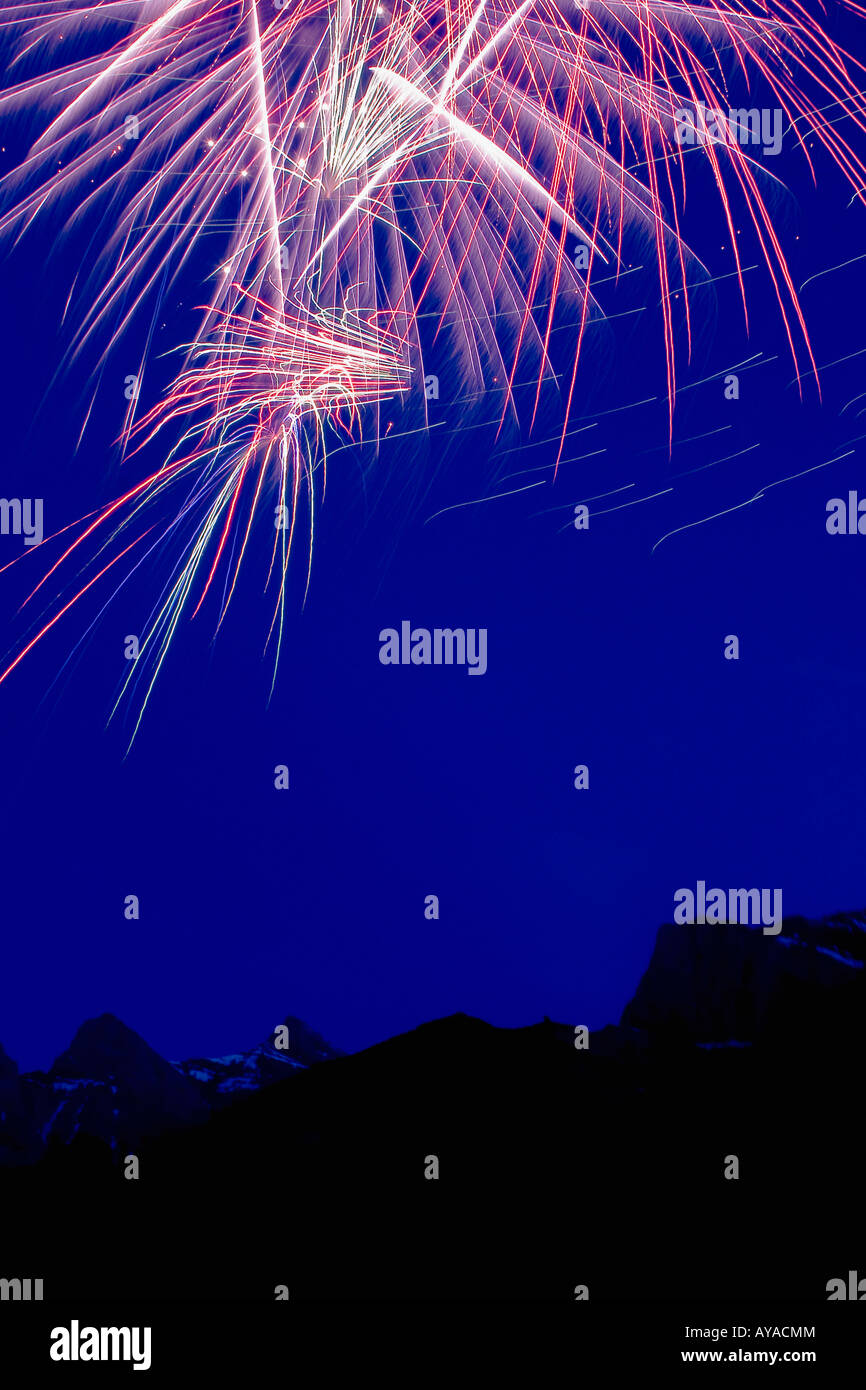 Fireworks over the mountains Stock Photo - Alamy