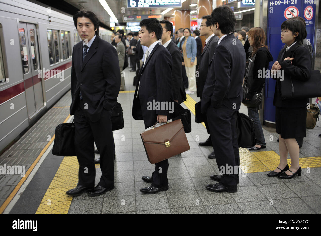 Asia Tokyo Japan Commuters crowd onto subway train during morning rush ...