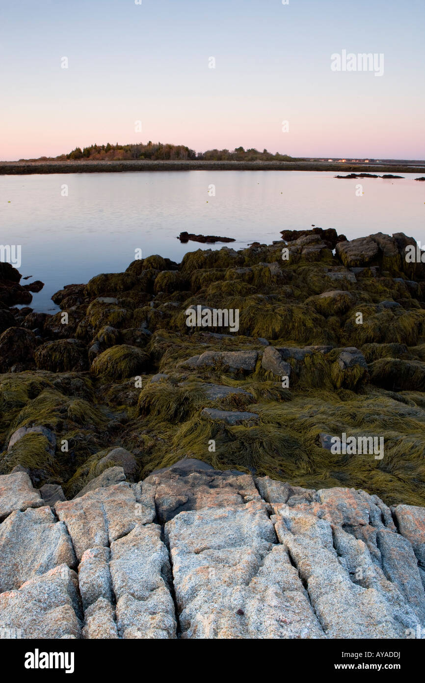 The rocky coast of Timber Point before sunrise in Biddeford, Maine ...
