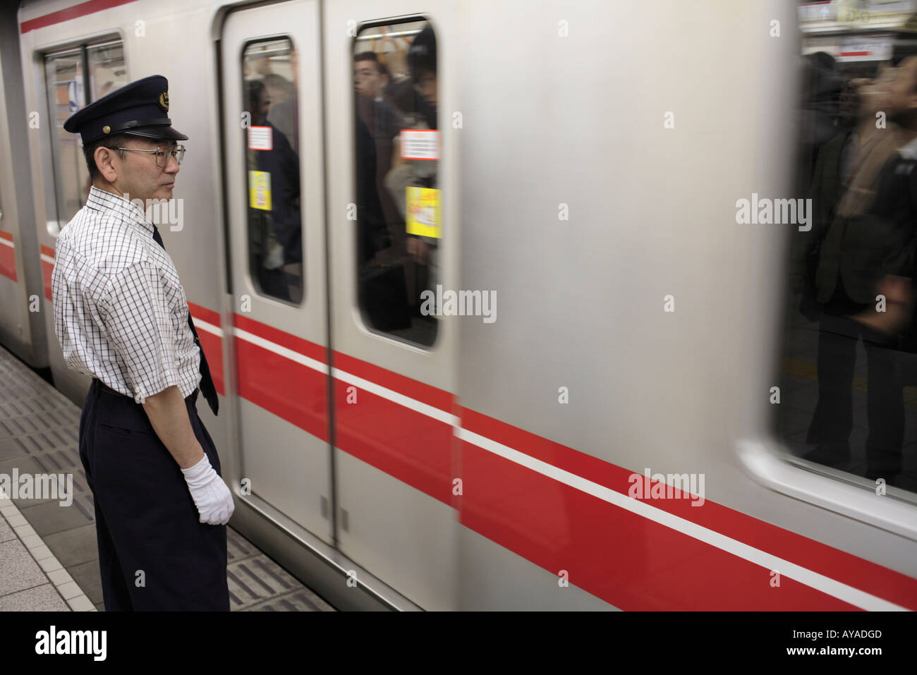 Tokyo subway guard hi-res stock photography and images - Alamy