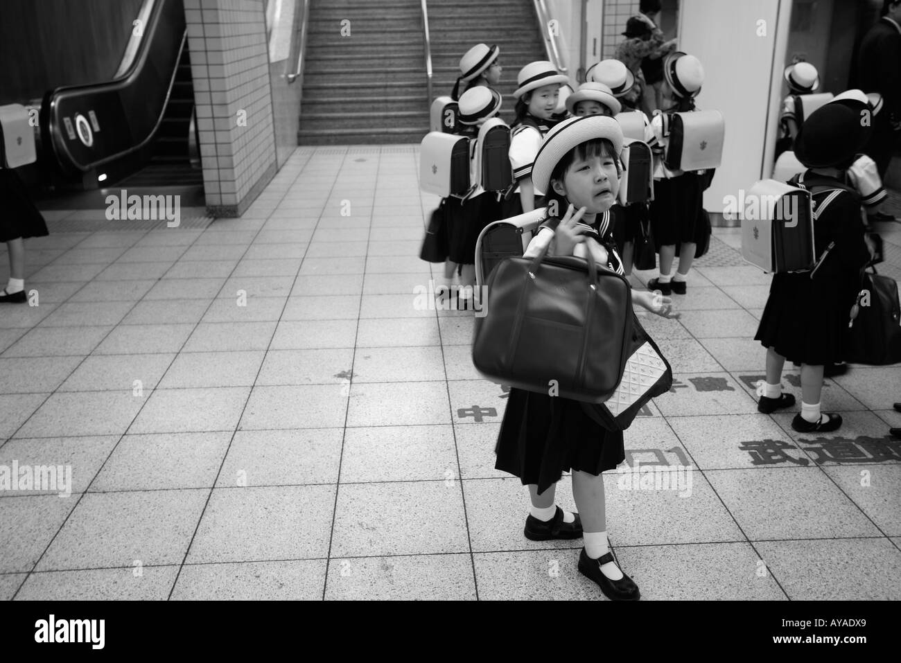 Asia Tokyo Japan Young school girl in uniform on subway train Stock ...