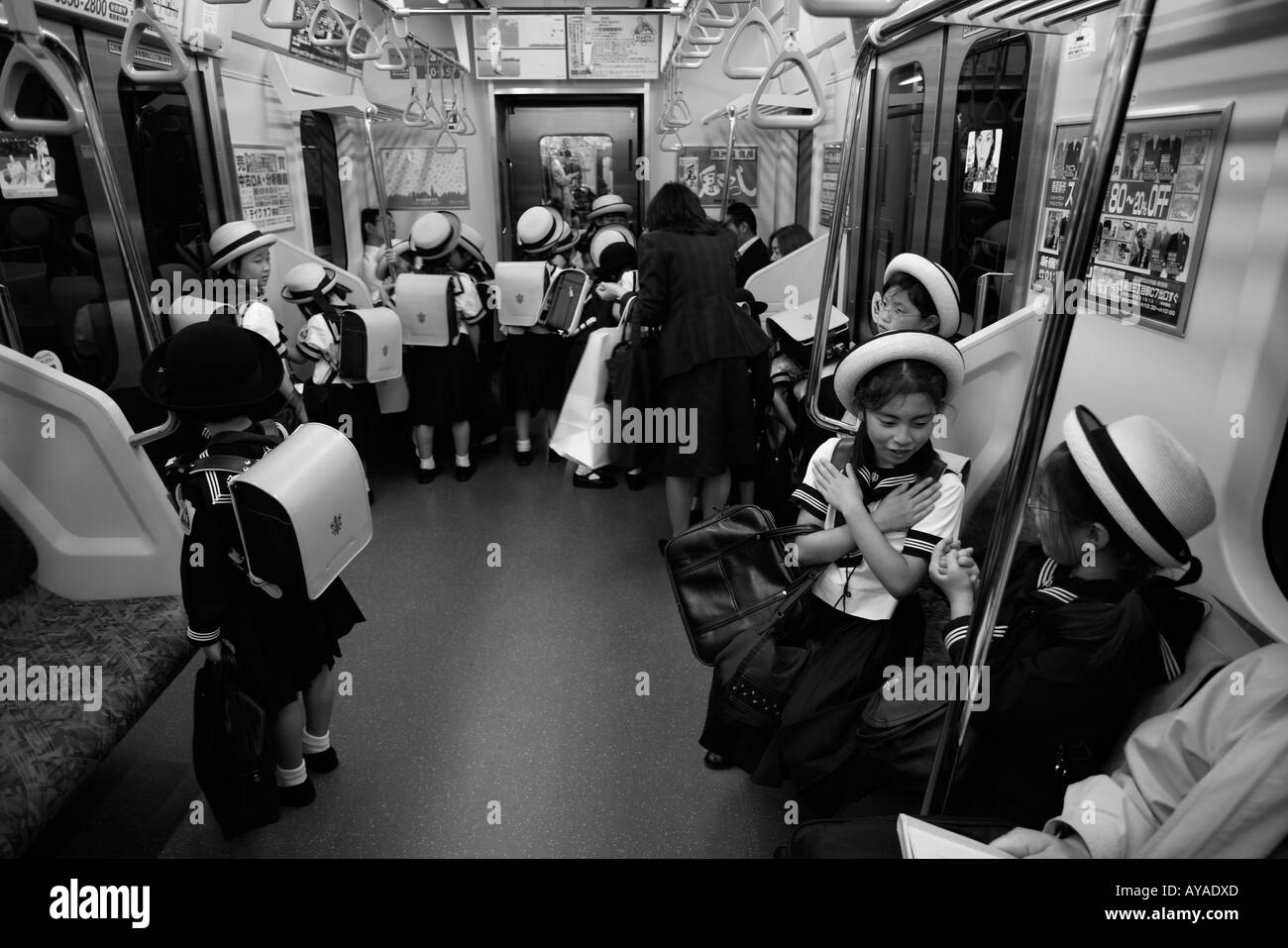 Asia Tokyo Japan Young school girl in uniform on subway train Stock ...