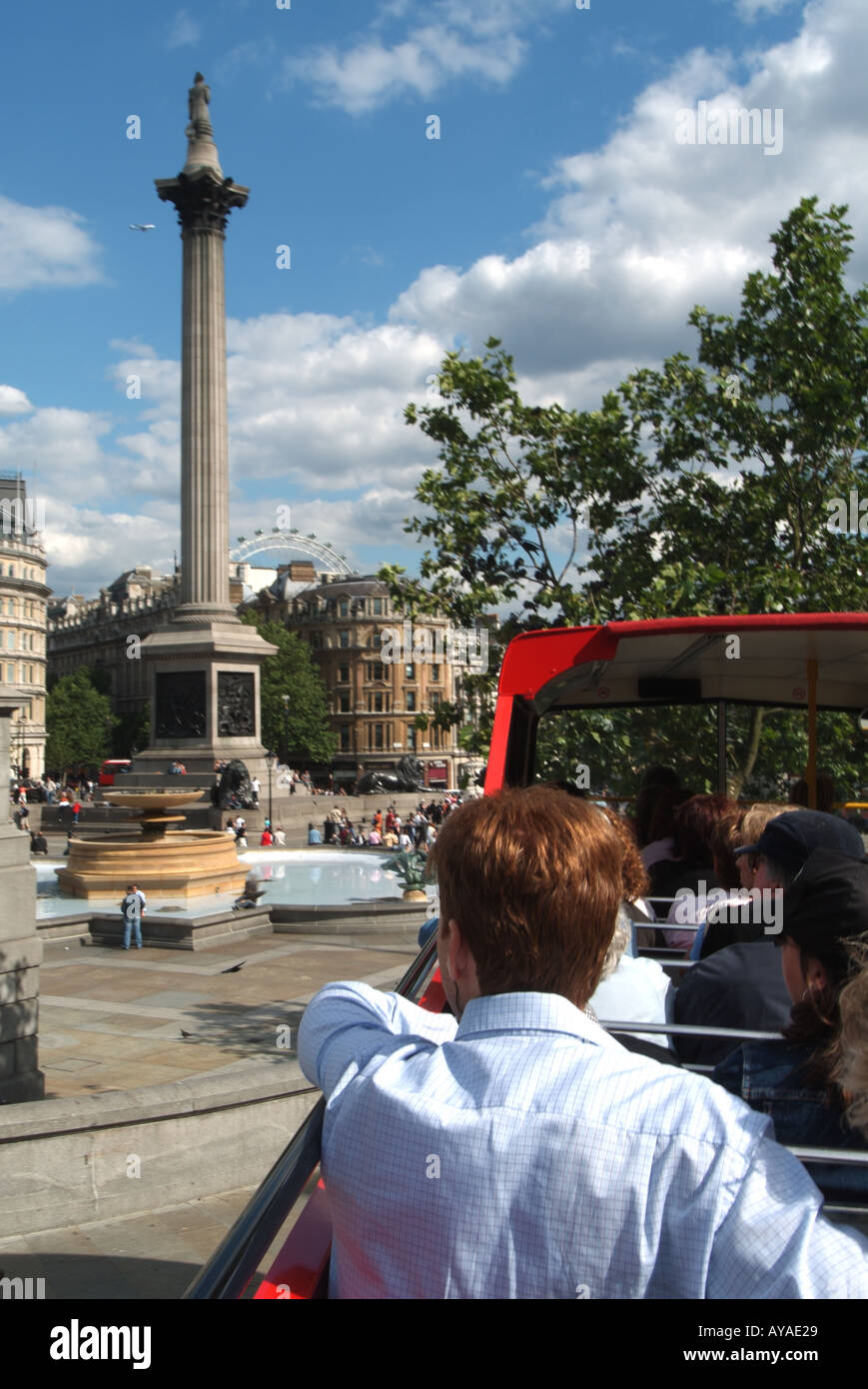 London Trafalgar Square passengers onboard open top tour sightseeing ...