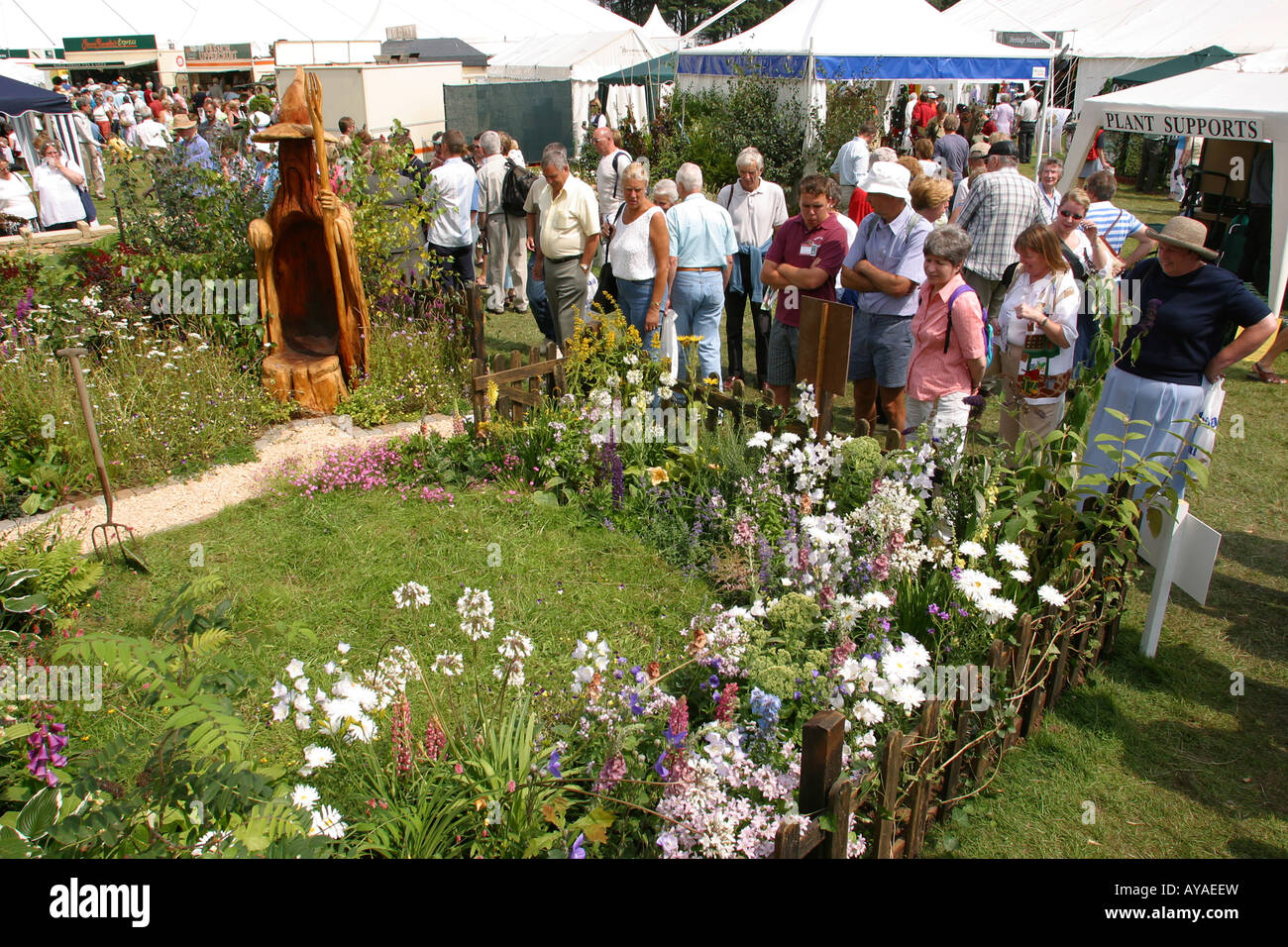 UK Cheshire Knutsford Tatton Hall RHS Flower Show visitors admiring ...