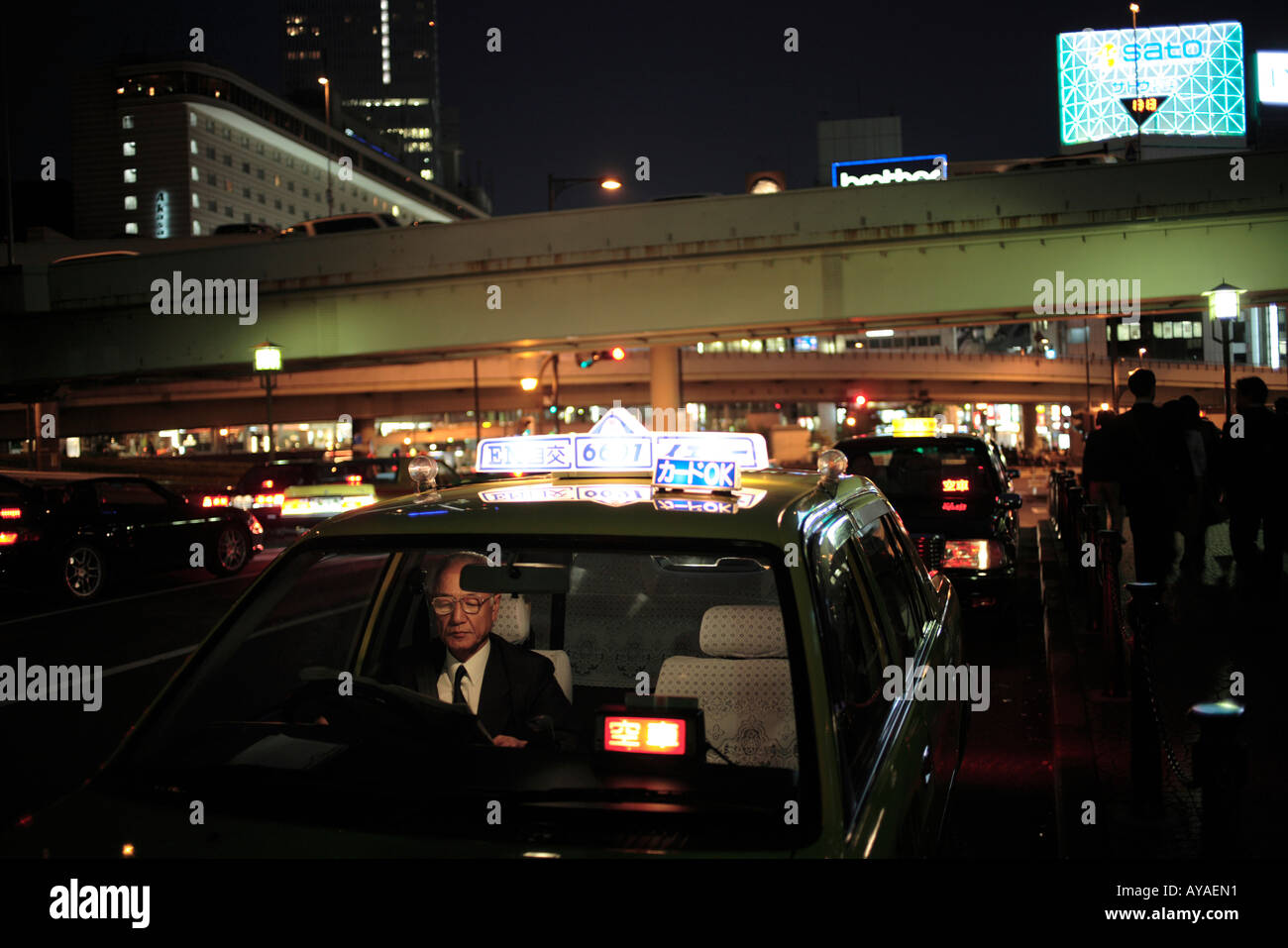 Asia Tokyo Japan Taxi driver waiting in queue in Akasaka District at ...
