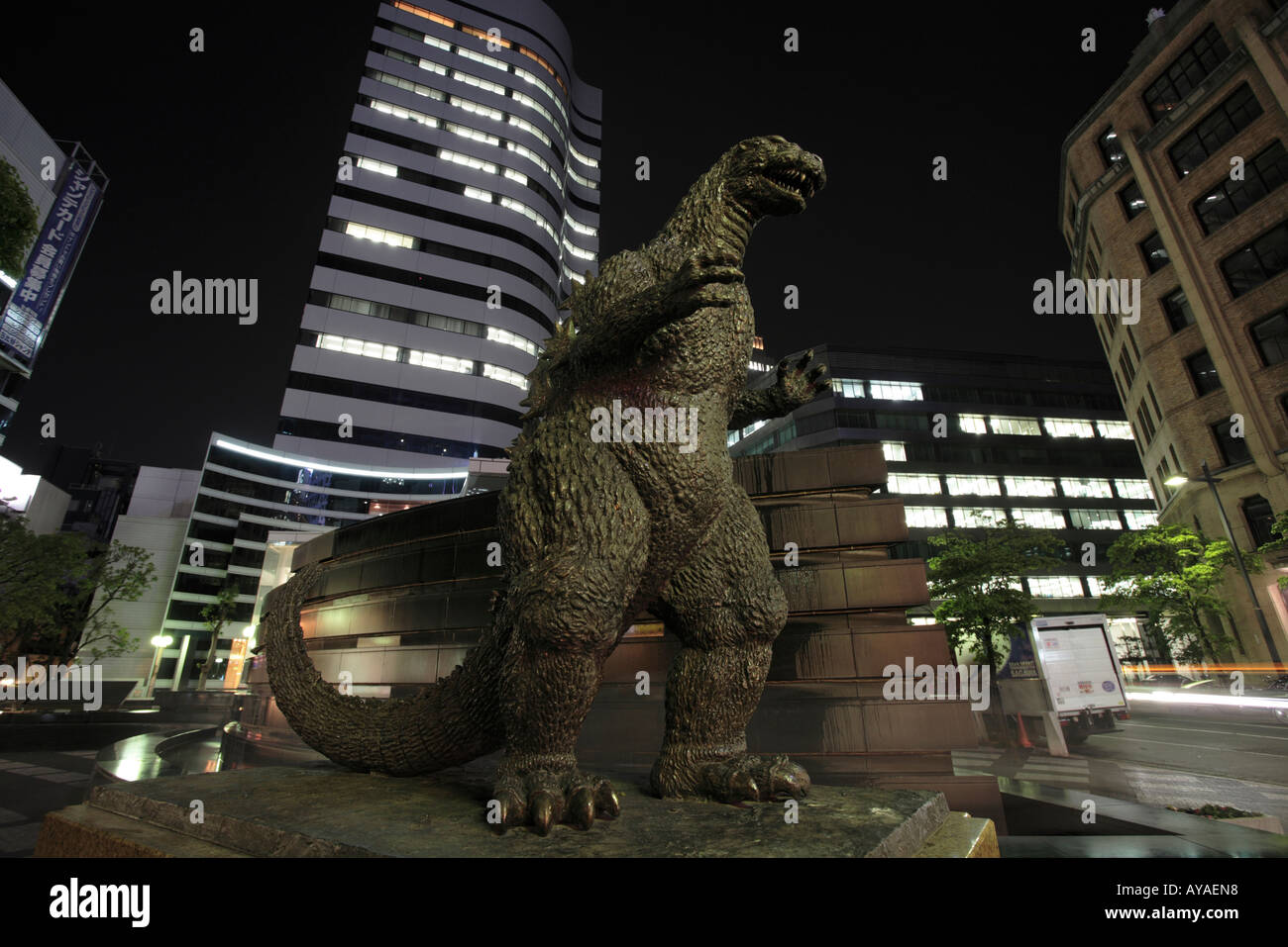 Asia Tokyo Japan Small statue of Godzilla in Hibiya District at night ...