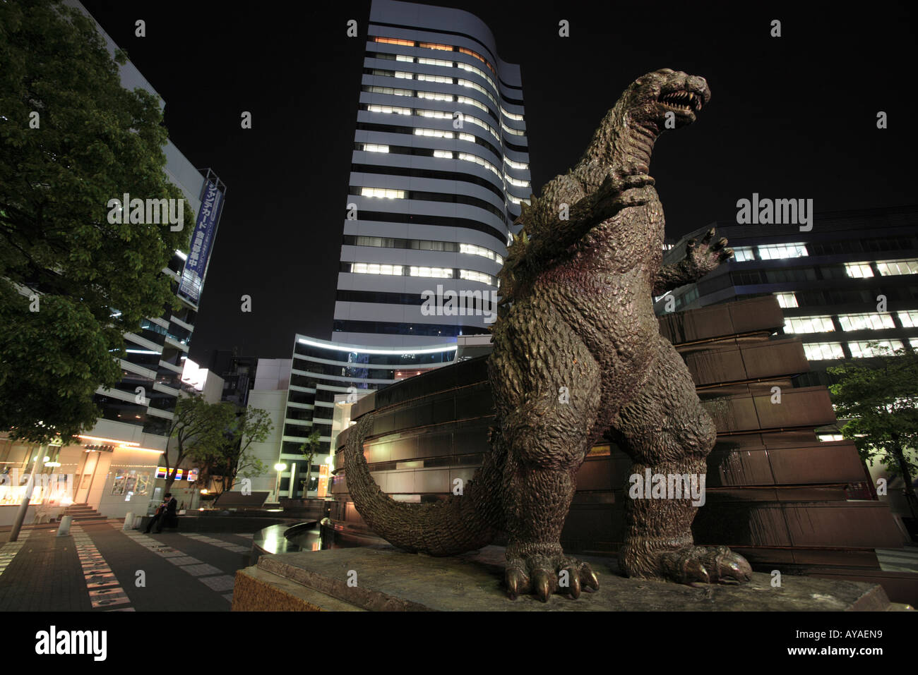Asia Tokyo Japan Small statue of Godzilla in Hibiya District at night ...
