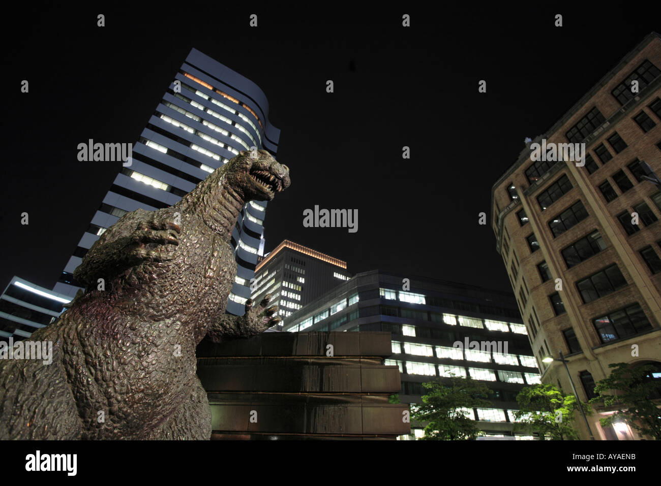 Asia Tokyo Japan Small statue of Godzilla in Hibiya District at night ...