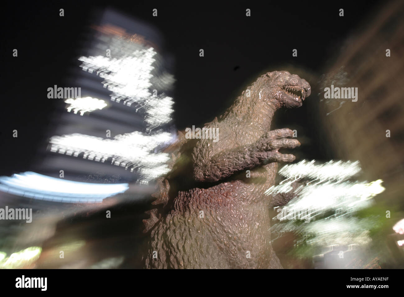 Asia Tokyo Japan Small statue of Godzilla in Hibiya District at night ...