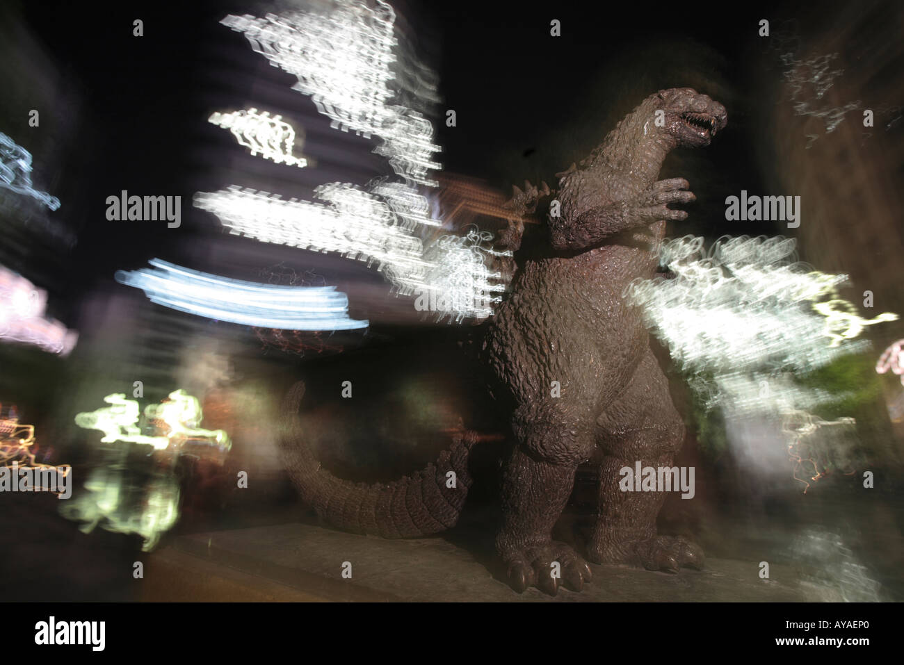 Asia Tokyo Japan Small statue of Godzilla in Hibiya District at night ...