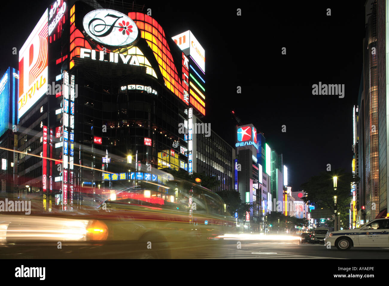 Asia Tokyo Japan Neon lit buildings in Ginza District at night Stock ...